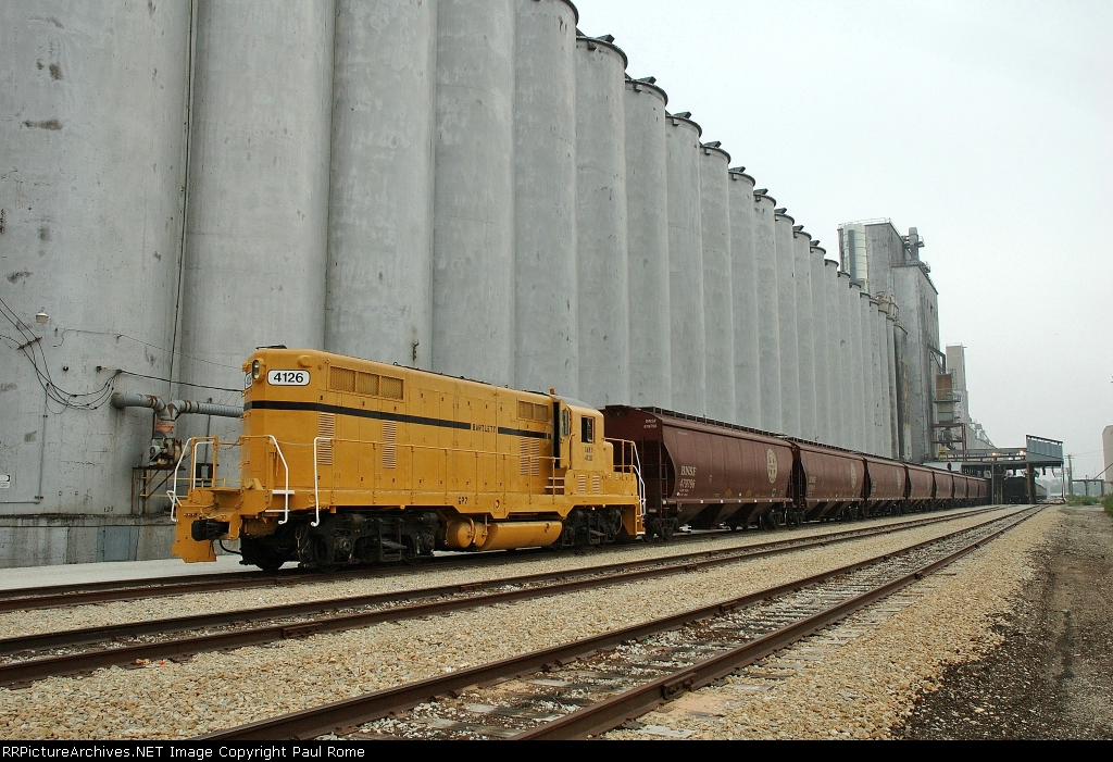 BARX 4126, EMD GP7, ex C&NW deep works the huge Bartlett Grain elevator
